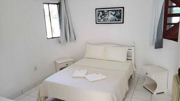 Quarto duplo standard | Frigobar, cortinas blackout, Wi-Fi de cortesia, roupa de cama