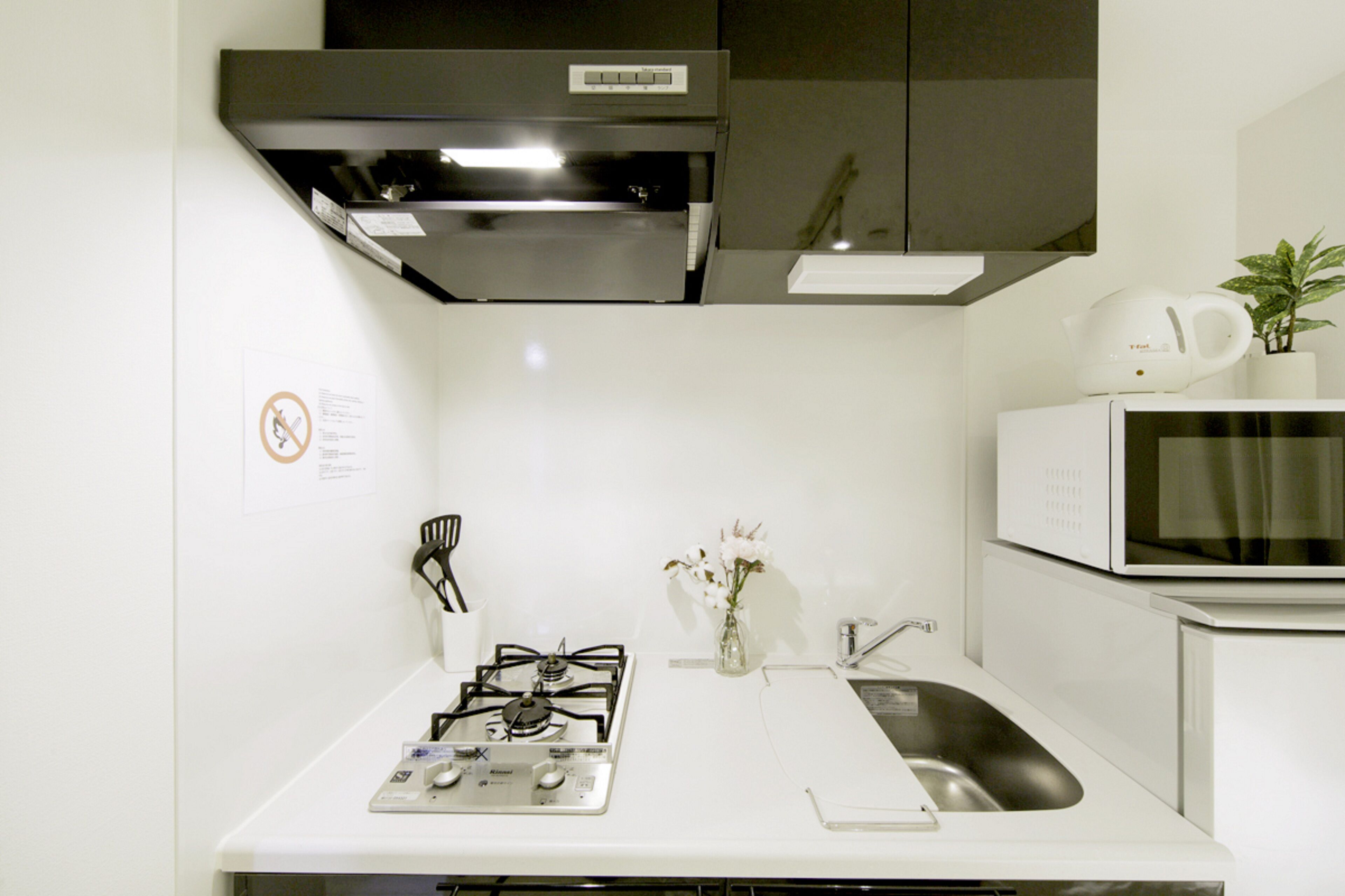 Apartamento (Nestay inn Tokyo Otsuka 101) | Cozinha privada | Minifrigorífico, um micro-ondas, uma placa de cozinha 