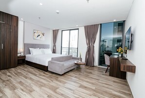Apartamento Deluxe, 1 quarto | Roupa de alta qualidade, camas de colchão viscoelástico, minibar