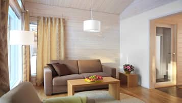 Apartamento, sauna (68 m2) | Sala de estar | TV de ecrã plano, lareira, leitor de DVD