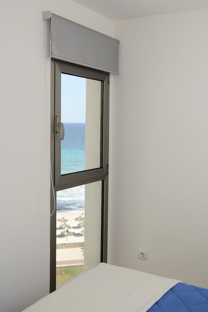 Moderno Appartamento Fronte Mare - Sa Coma