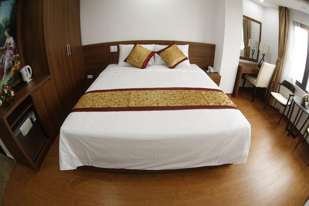 Quarto casal, 1 cama King | Frigobar, cofres nos quartos, escrivaninha