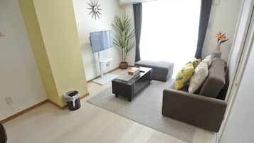 Quarto família | Sala de estar | TV de tela plana
