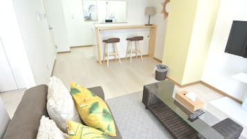 Quarto família | Sala de estar | TV de tela plana