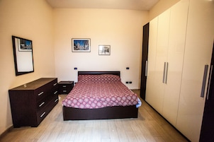 2 quartos, berço de viagem 