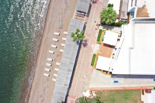 Uma praia privada, autocarro grátis para a praia 