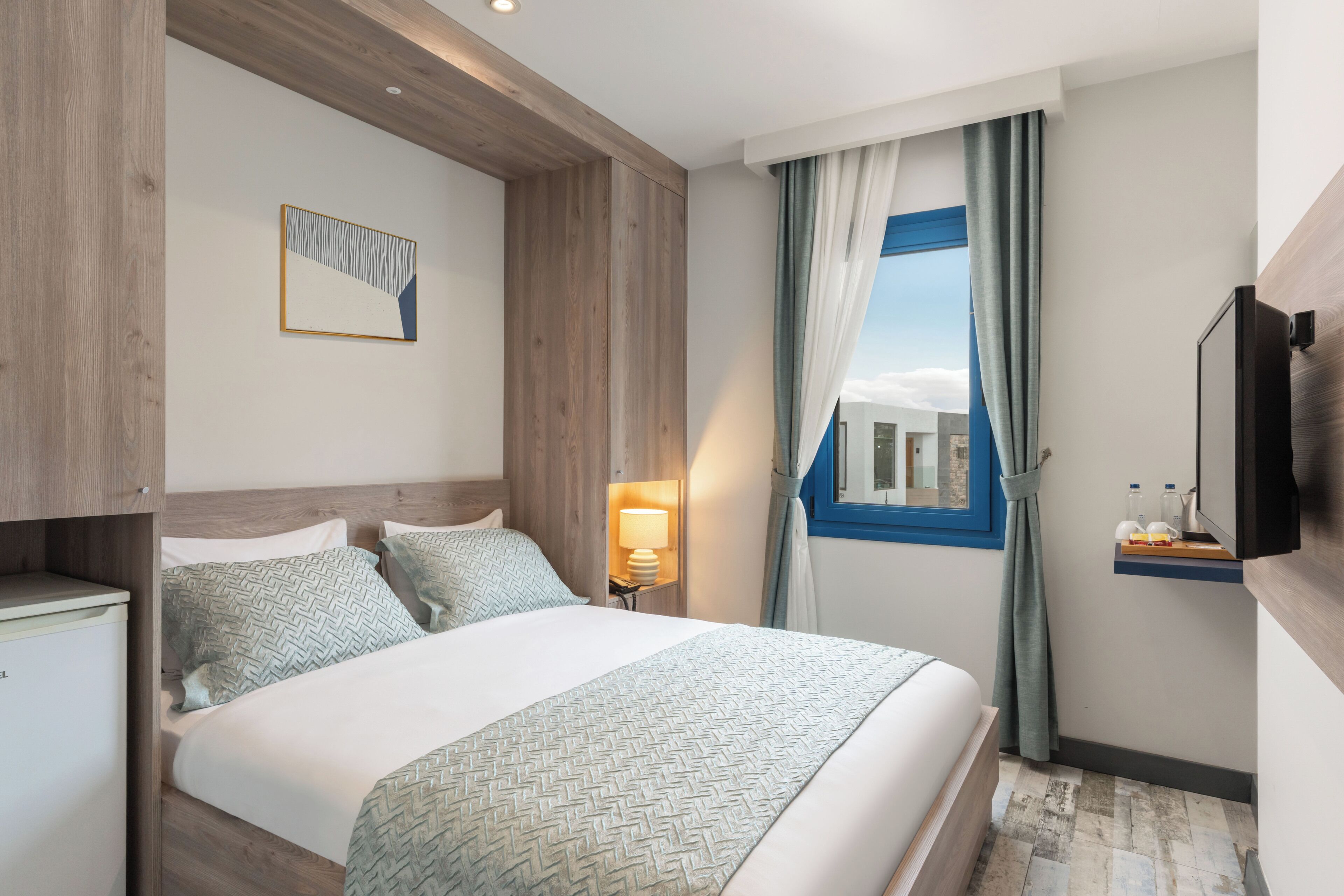 Quarto casal standard | Roupas de cama premium, frigobar, cofres nos quartos