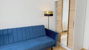 Apartamento | Sala de estar | Televisor