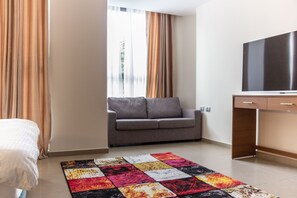 Apartamento Panorâmico | Sala de estar | Smart TV de 44 de polegadas com canais digitais, televisor, Netflix 