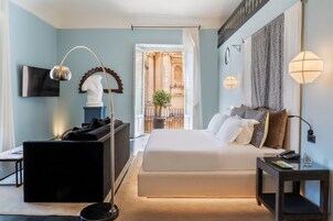 Suíte executiva, vista para a cidade | Frigobar, quartos à prova de som, Wi-Fi de cortesia