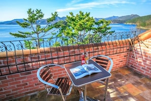 Quarto (Beach-dong 302) | Wi-Fi de cortesia, roupa de cama