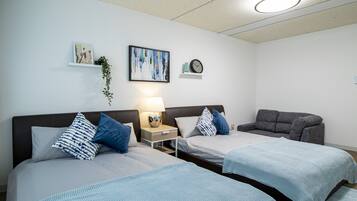 Apartamento Familiar, várias camas, não fumadores, vista para o jardim | 3 quartos, Wi-fi grátis