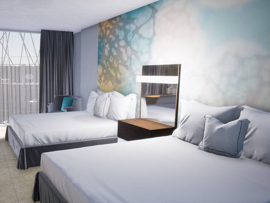 Quarto de hotel moderno com duas camas, uma janela grande e vista para a cidade.
