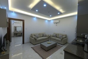 Apartamento | Sala de estar | TV 30 polegadas com canais via satélite