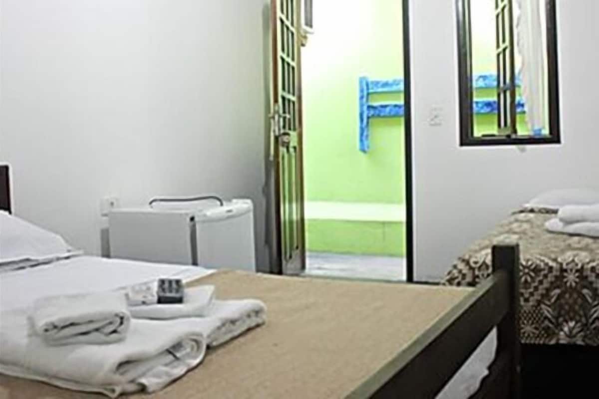 Quarto duplo externo | Frigobar, Wi-Fi de cortesia
