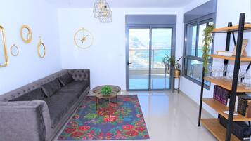 Apartamento Comfort, 1 quarto, pátio | Sala