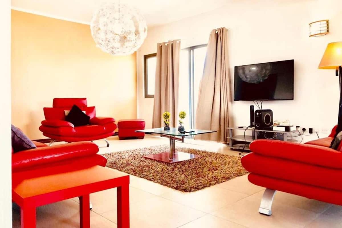 Penthouse Deluxe | Sala | TV de ecrã plano