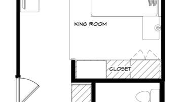 Planta baixa com varanda, quarto com cama de casal, armário e banheiro.