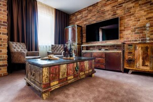 Estúdio Deluxe | Sala de estar | Televisor 