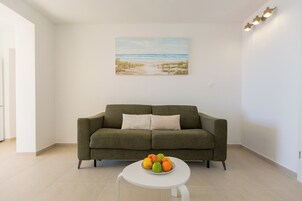 Apartamento luxo | Área de estar | TV
