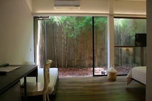 Quarto luxo | Área de estar | TV LCD, DVD player