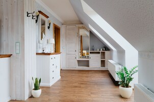 Suíte júnior | Área de estar | TV de tela plana