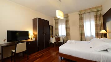 Roupas de cama premium, edredons de pluma, frigobar, cofres nos quartos