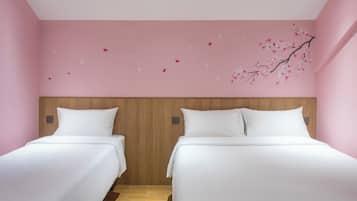 Quarto Triplo | Cortinas/cortinados opacos, Wi-fi grátis, roupa de cama fornecida