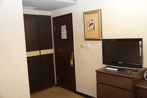 Quarto empresarial | Cofres nos quartos, Wi-Fi de cortesia, roupa de cama