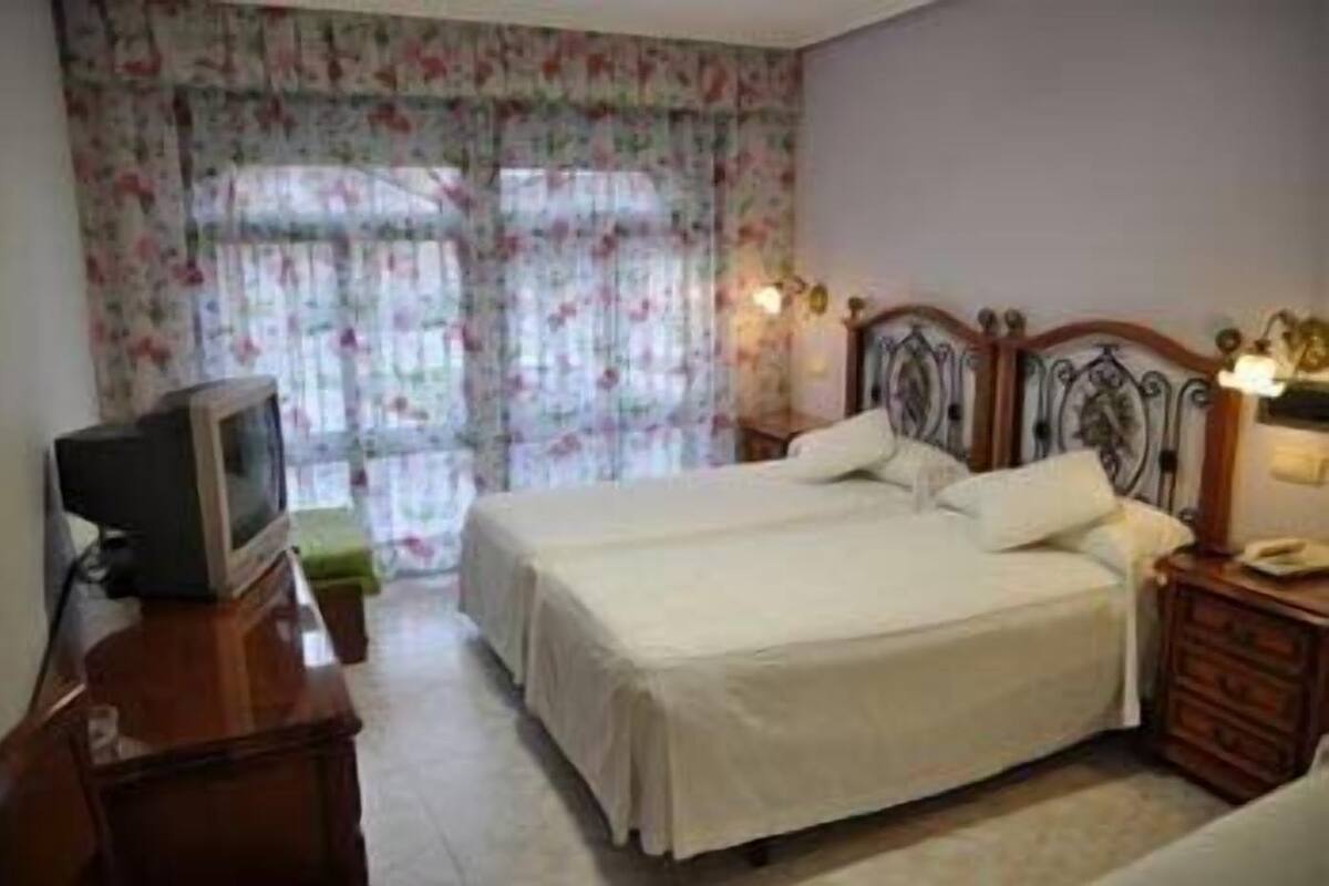 Quarto Triplo | Roupa de alta qualidade, Wi-fi grátis 