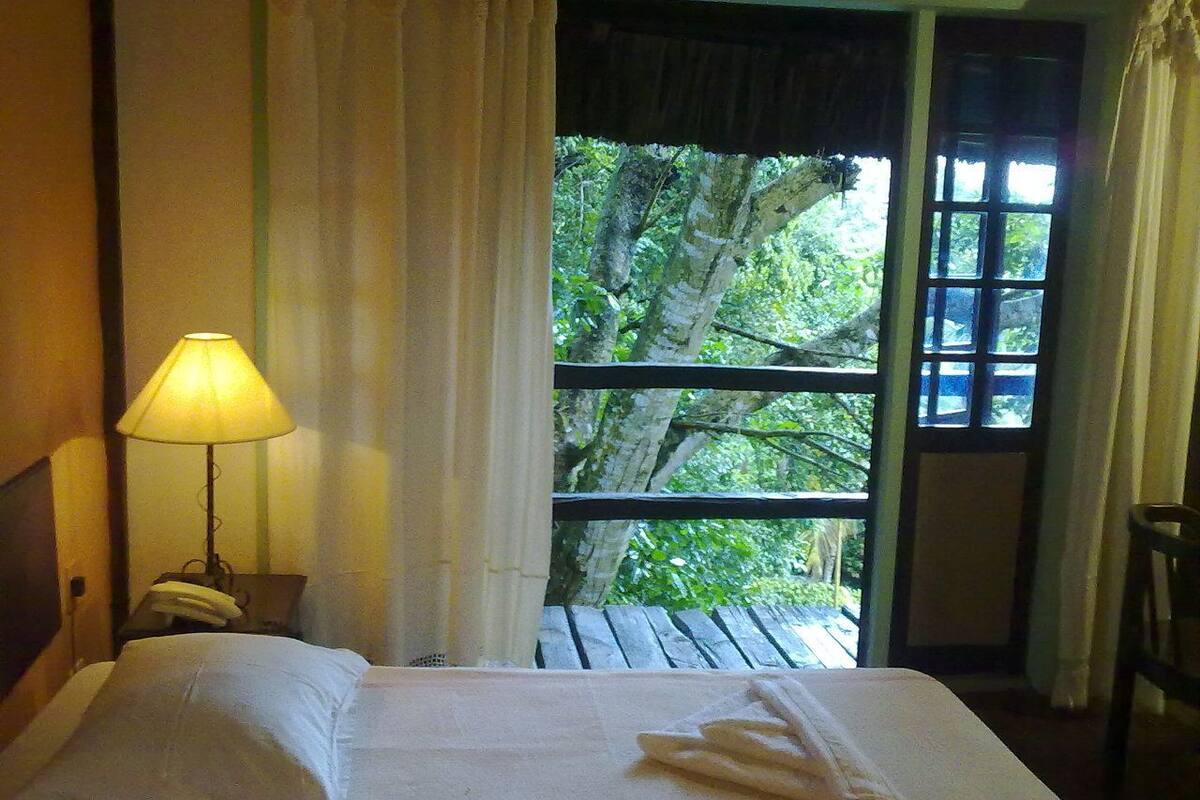 Suite (Lírio Superior) | Minibar, camas desdobráveis, Wi-fi grátis, roupa de cama fornecida 