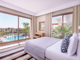 Suíte executiva | Frigobar, cofres nos quartos, cortinas blackout, Wi-Fi de cortesia