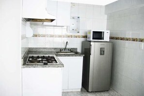 Apartamento, 1 quarto | Cozinha americana privada