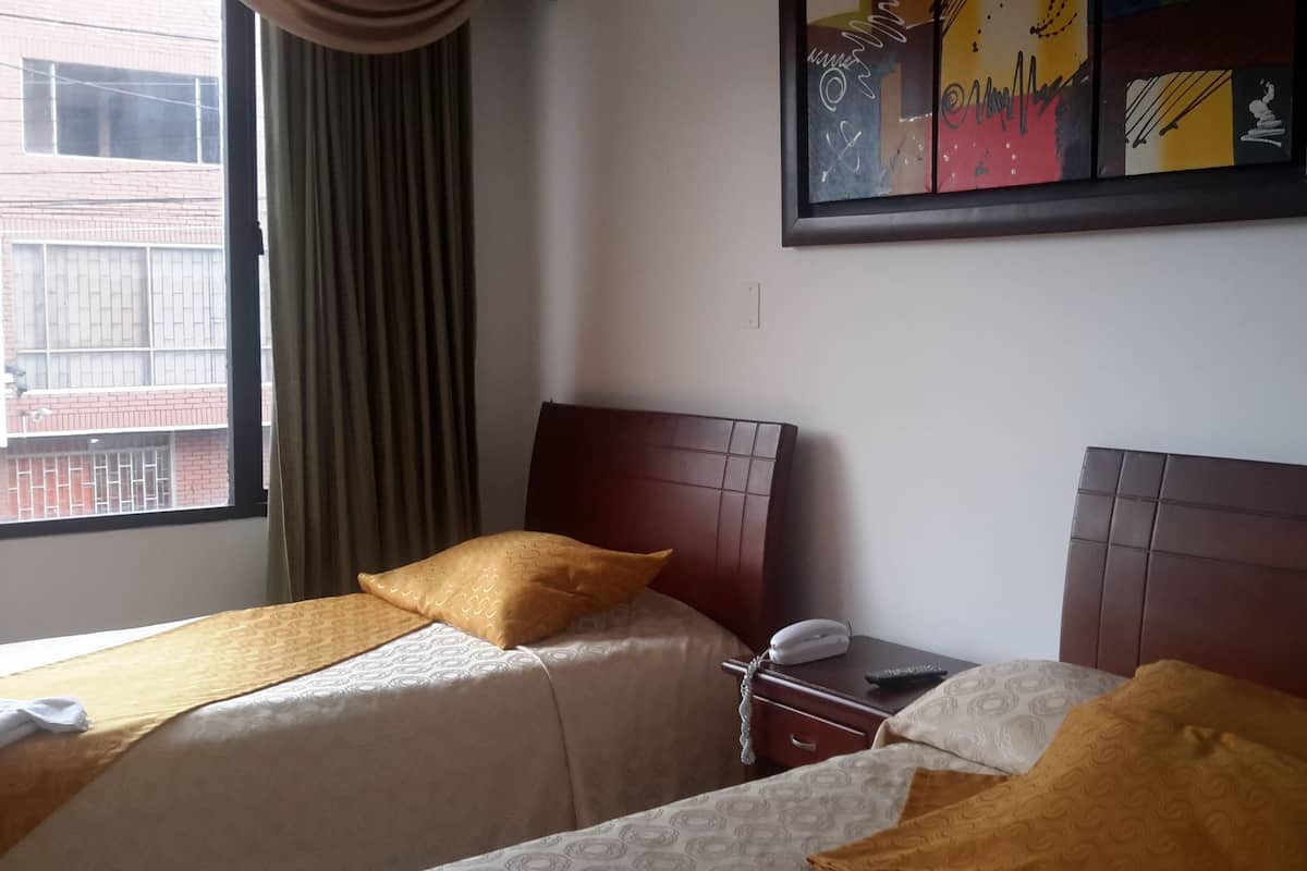 Quarto Twin | Ferro/tábua de engomar, Wi-fi grátis, roupa de cama fornecida