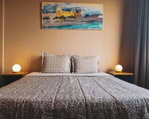 Suíte standard, 1 cama de casal | Wi-Fi de cortesia, roupa de cama