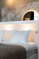 Suíte grand | Roupas de cama premium, frigobar, cofres nos quartos, escrivaninha