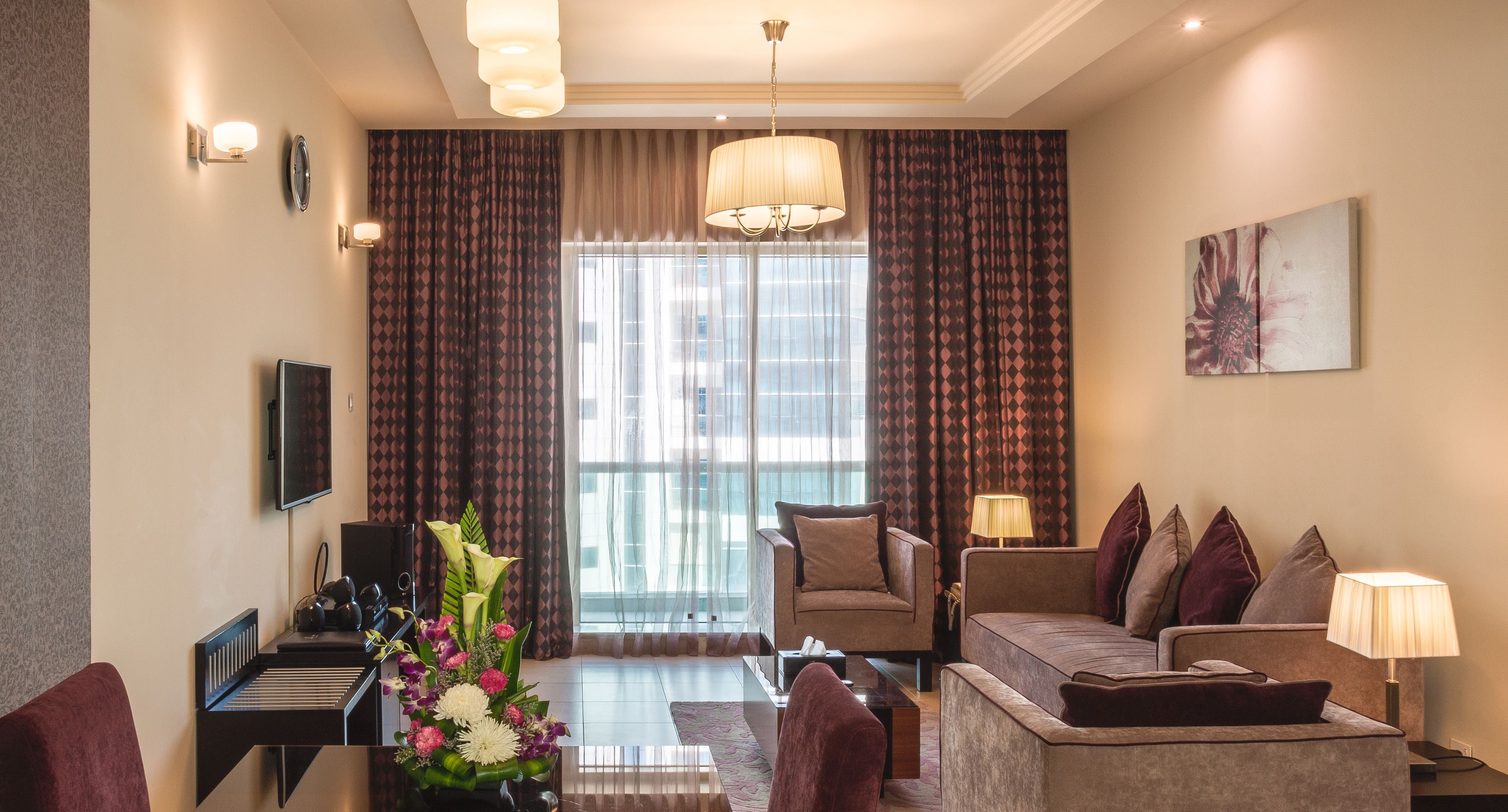 Apartamento, 1 quarto | Área de estar | TV LCD 32 polegadas com canais a cabo, TV