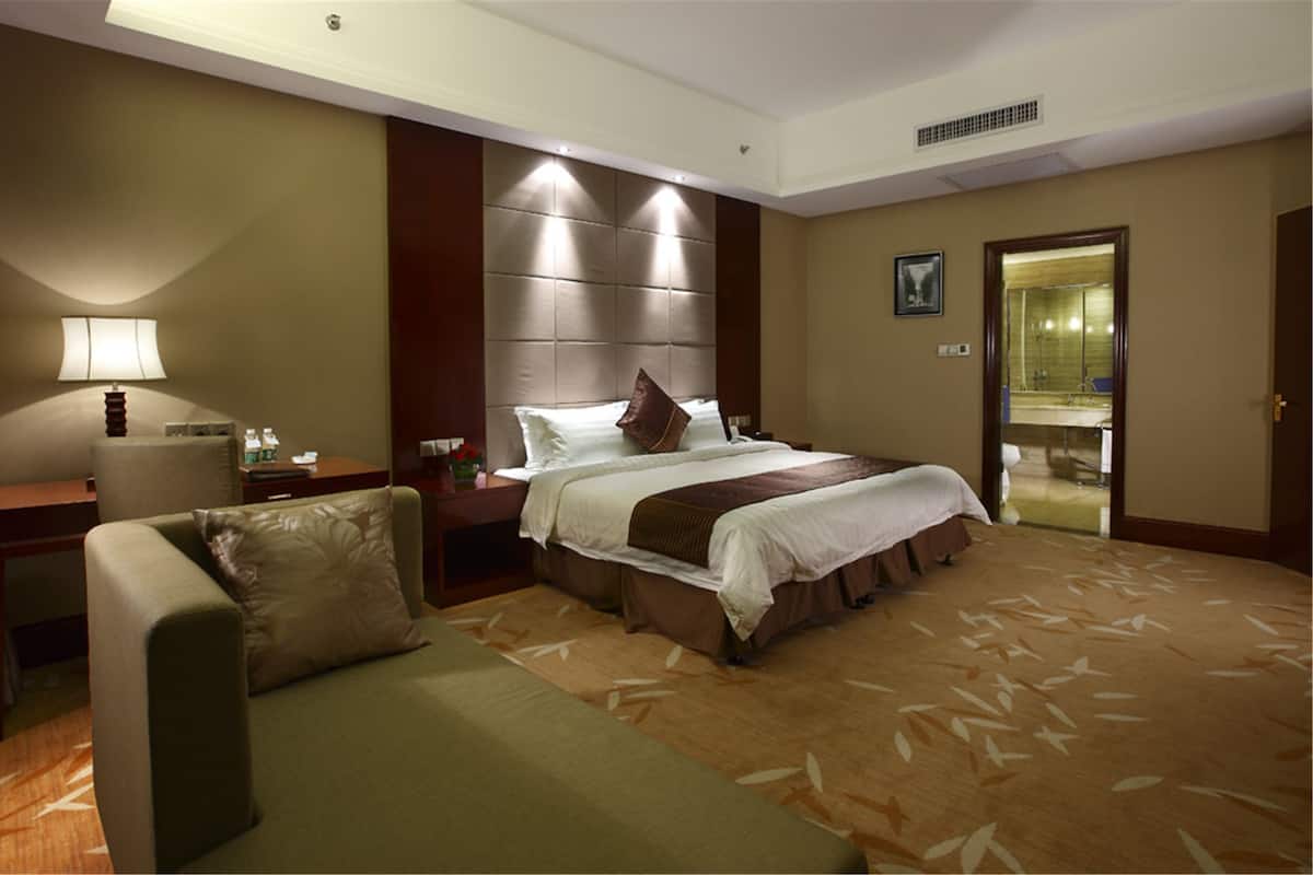 Suíte executiva, 1 cama King | Área de estar | TV LCD