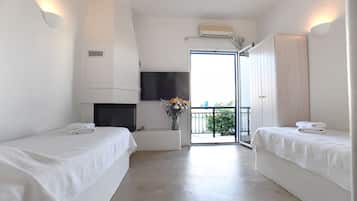 Apartamento | Roupa de alta qualidade, edredões de penas, camas de colchão pillowtop