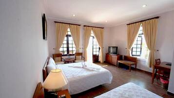 Bungalow, vista para o jardim | Minibar, cofre no quarto, secretária, Wi-fi grátis