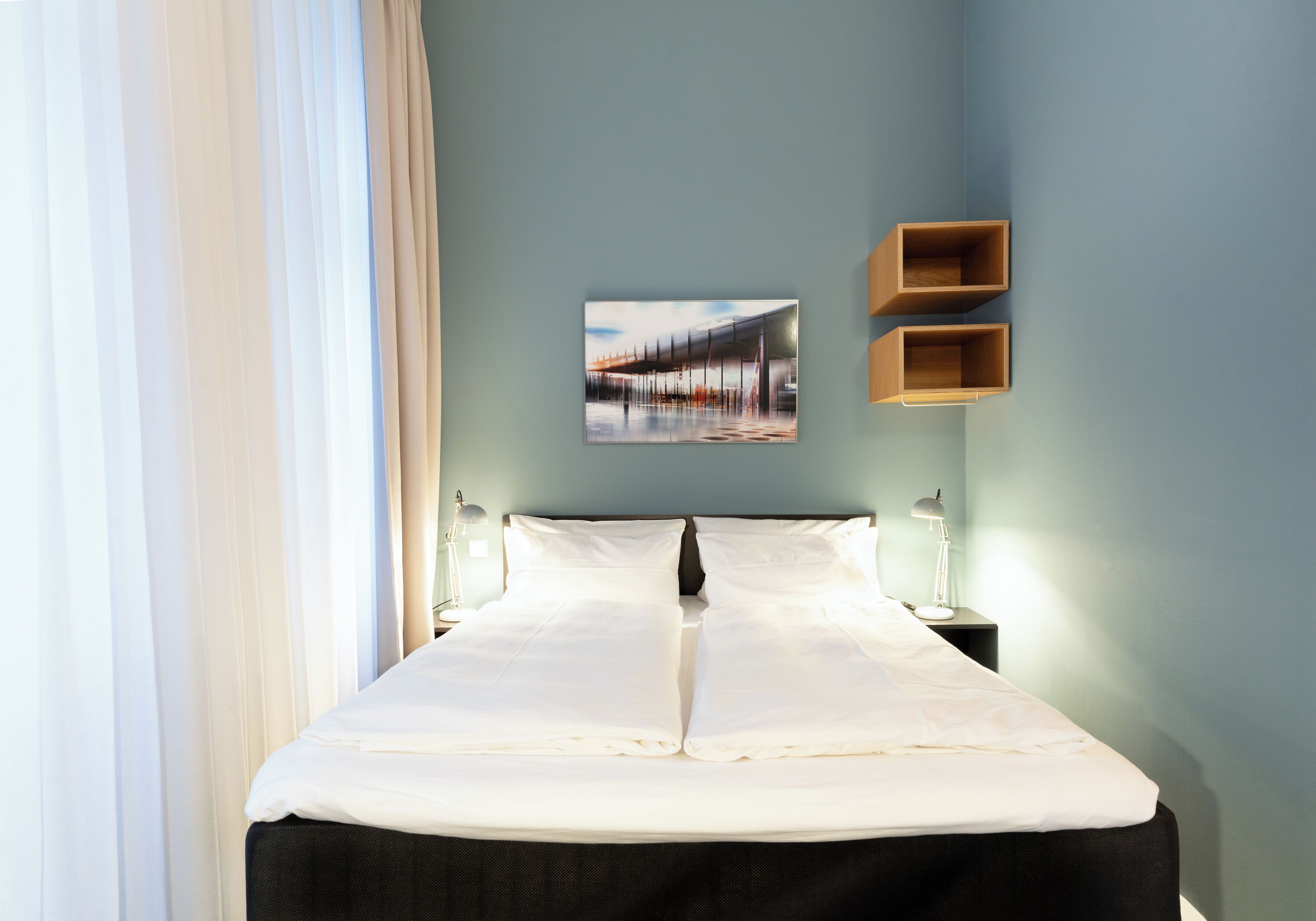 Quarto solteiro | Roupas de cama antialérgicas, cortinas blackout, Wi-Fi de cortesia