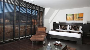 Edredons de pluma, camas Tempur-Pedic, frigobar, cofres nos quartos