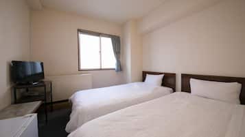 Quarto duplo | Cortinas blackout, Wi-Fi de cortesia, roupa de cama