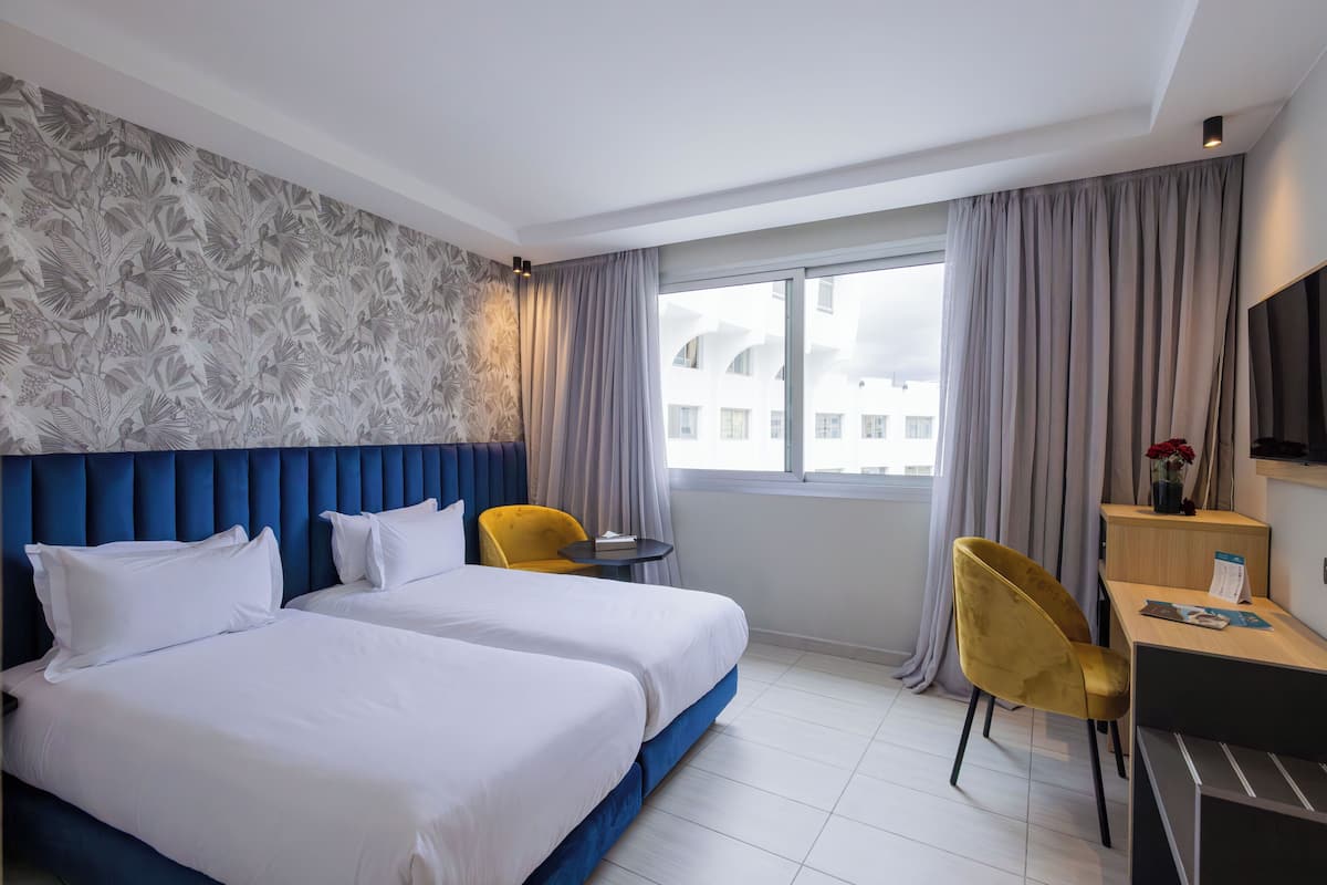 Superior Room, Twin beds | Lençóis italianos Frette, roupas de cama premium, frigobar