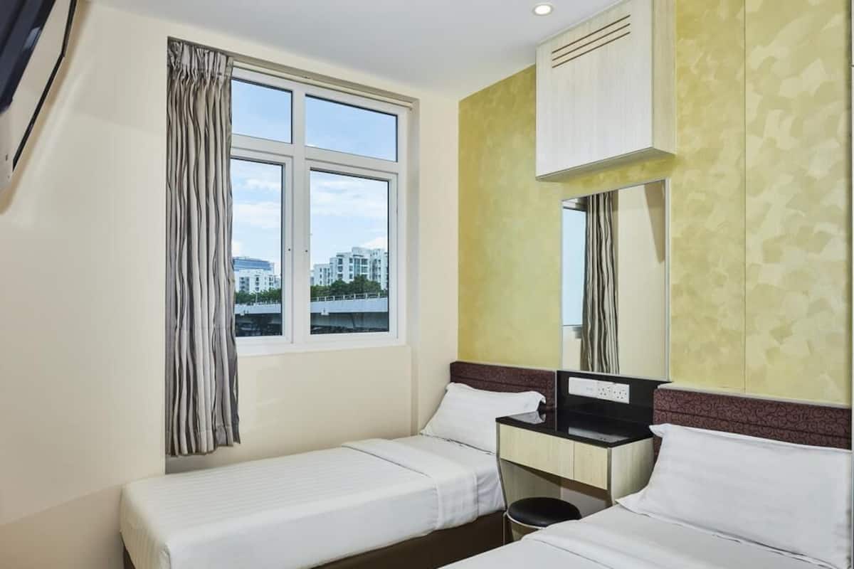 Quarto Superior, 2 camas individuais | Secretária, ferro/tábua de engomar, Wi-fi grátis