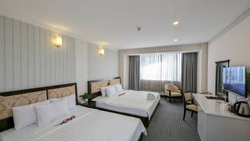 Quarto Deluxe | Minibar, cofre no quarto, Wi-fi grátis, roupa de cama fornecida