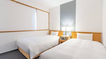 Quarto Twin | Edredões de penas, secretária, Wi-fi grátis, roupa de cama fornecida