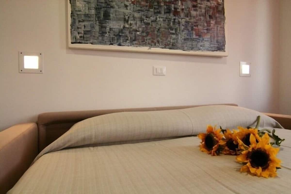 Quarto standard | Individualmente mobiliados, escrivaninha, berços, Wi-Fi de cortesia