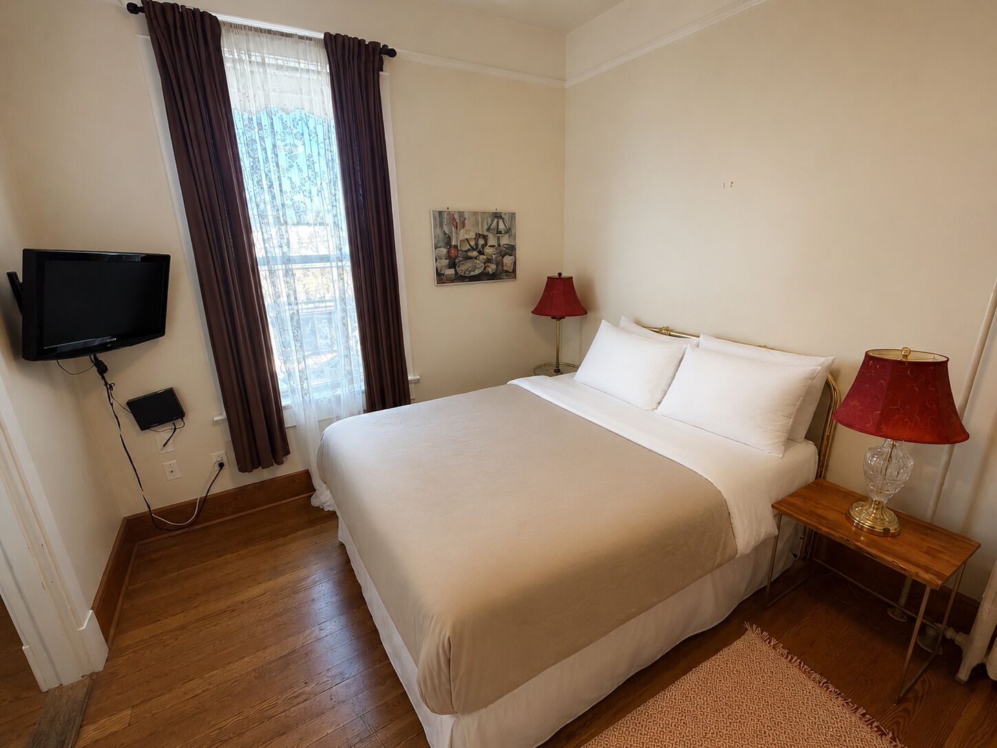 Suíte clássica, 1 cama Queen e sofá-cama, vista para a montanha | Escrivaninha, ferros/tábuas de passar roupa, Wi-Fi de cortesia