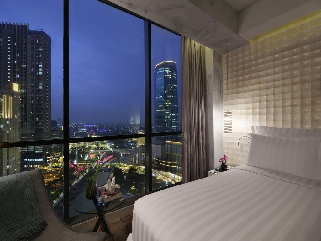 Quarto luxo, 1 cama King, vista para o parque | Frigobar (abastecido com alguns itens grátis), cofres nos quartos